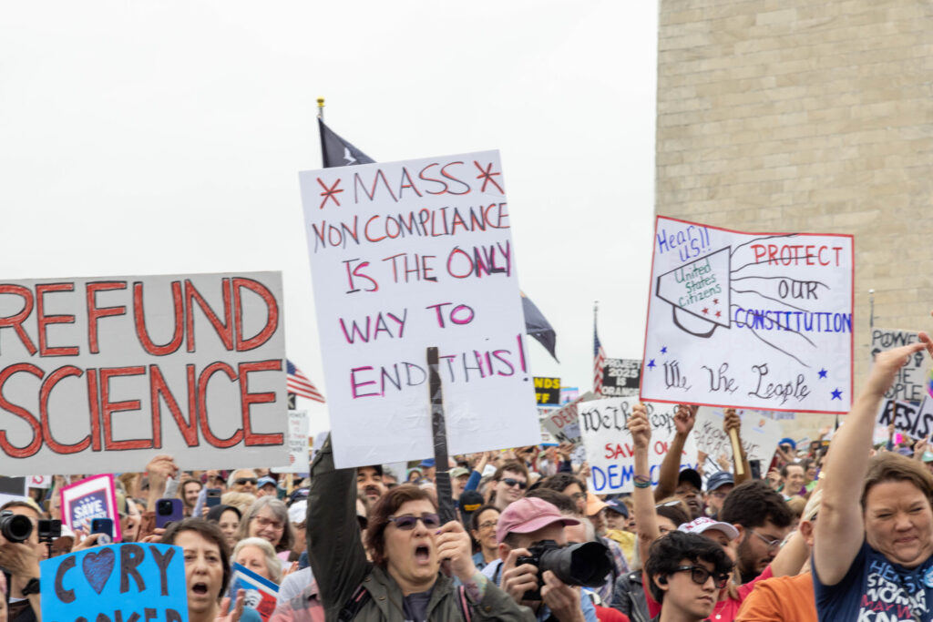 PHOTOS: Check Out These Signs at the “Hands Off!” Protest in DC ...